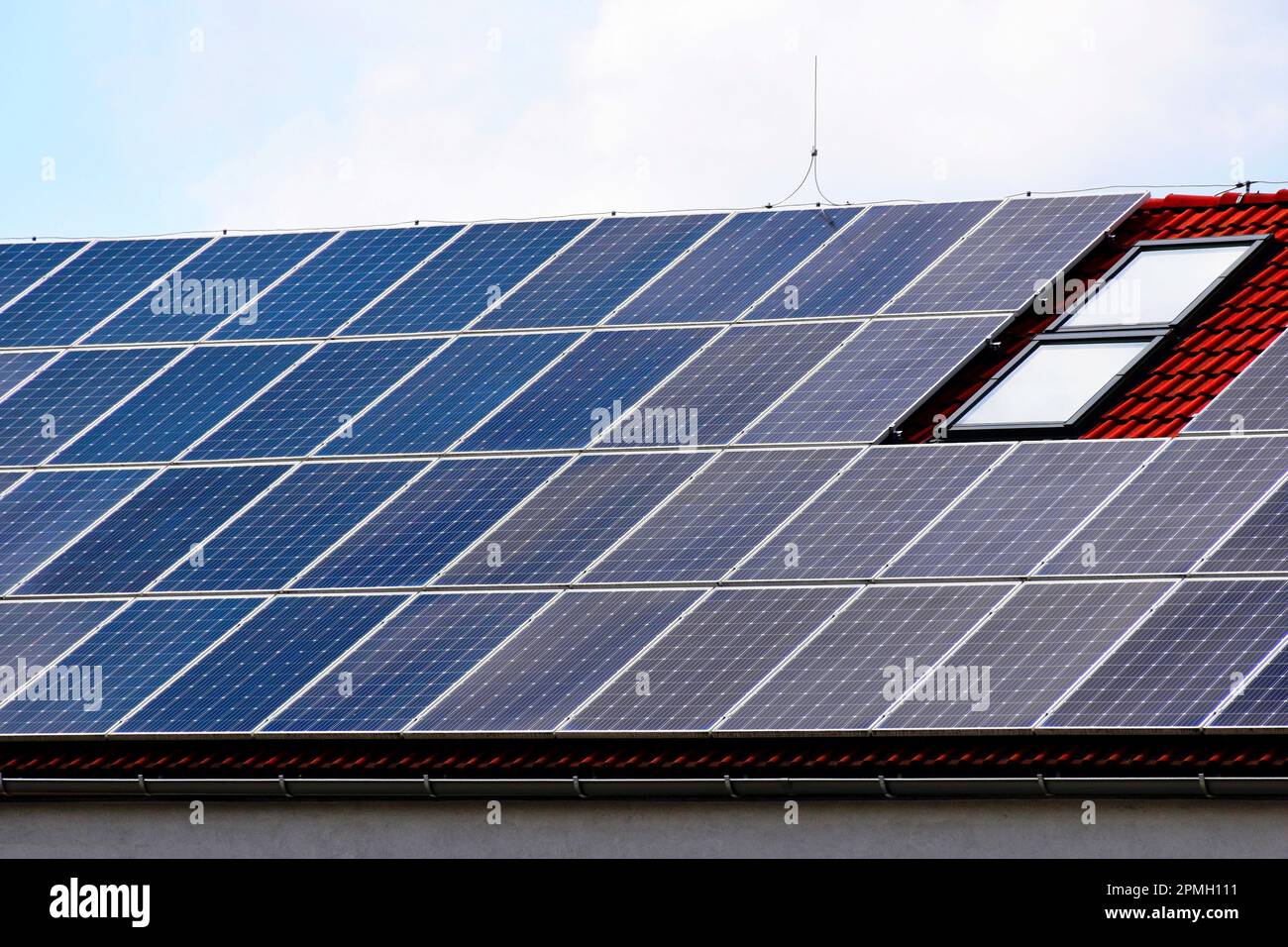 roof installed photovoltaic PV sun collector solar panels. sloped ...