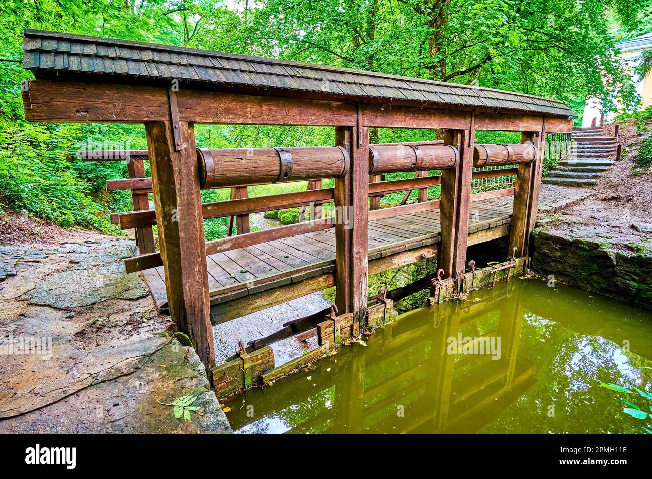 The old wooden dam with footbridge on small river in Sofiyivsky Park, Uman, Ukraine Stock Photo ...