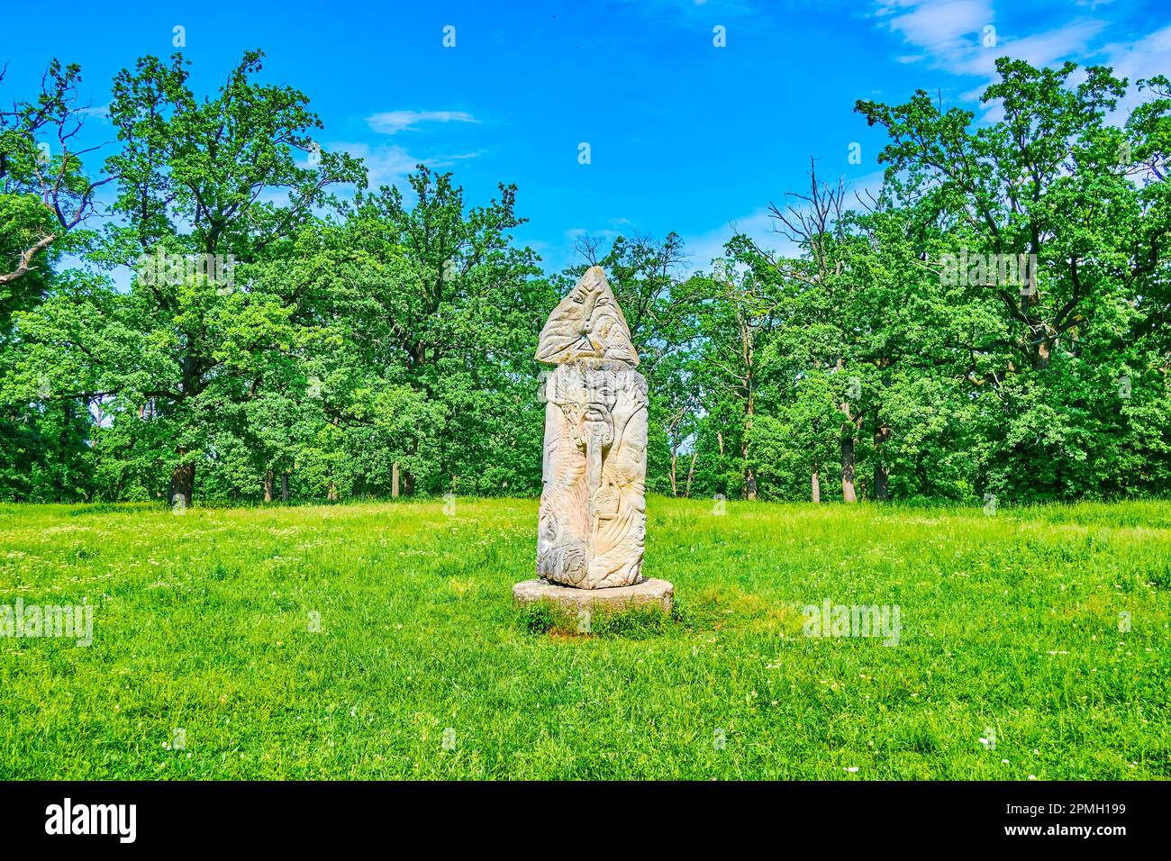 Pagan Slavic Idol with images of ancient Gods, Sofiyivka Park arboretum ...