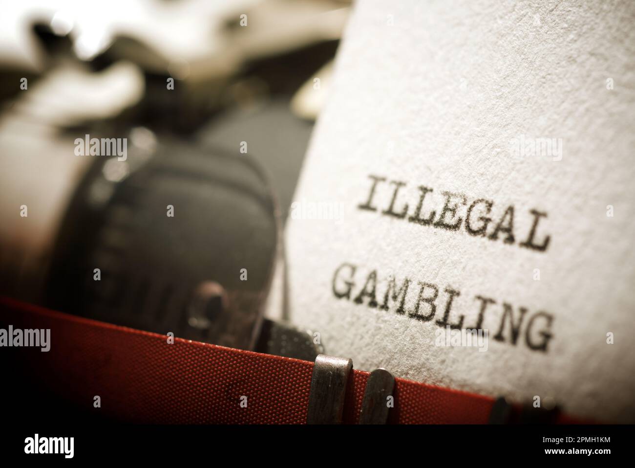 Illegal gambling text written with a typewriter Stock Photo - Alamy