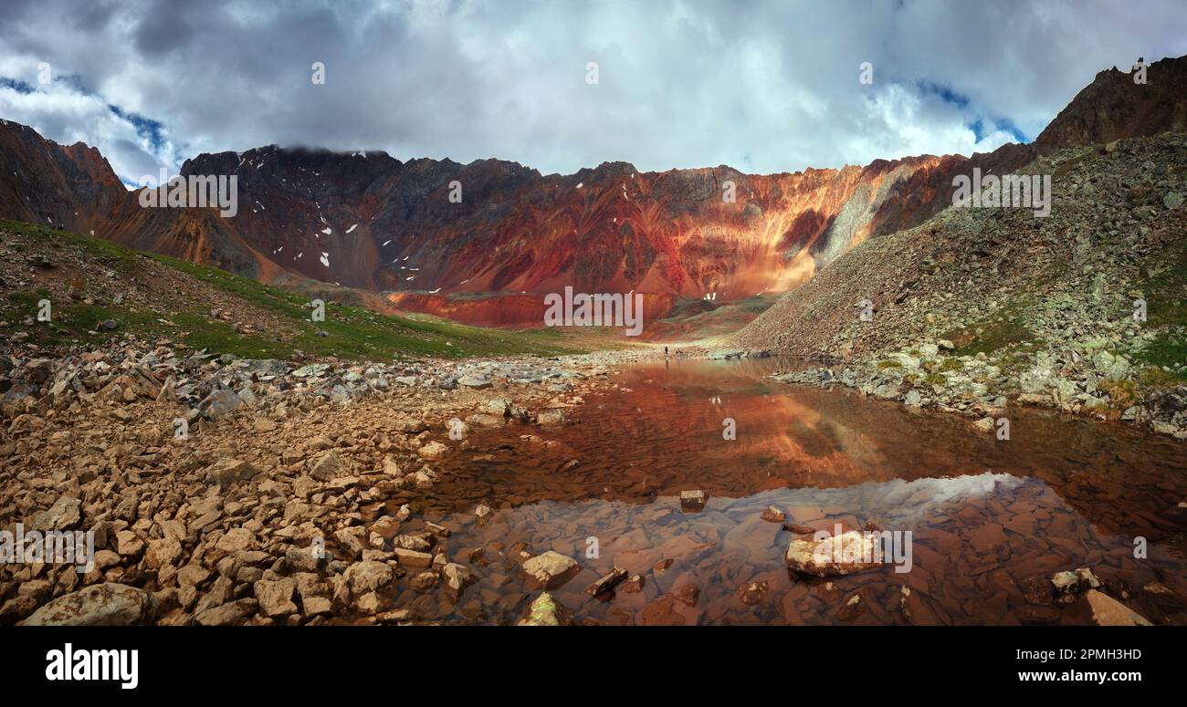 Hiking in the mountains. Rivers and mountain lakes, summer landscape of ...