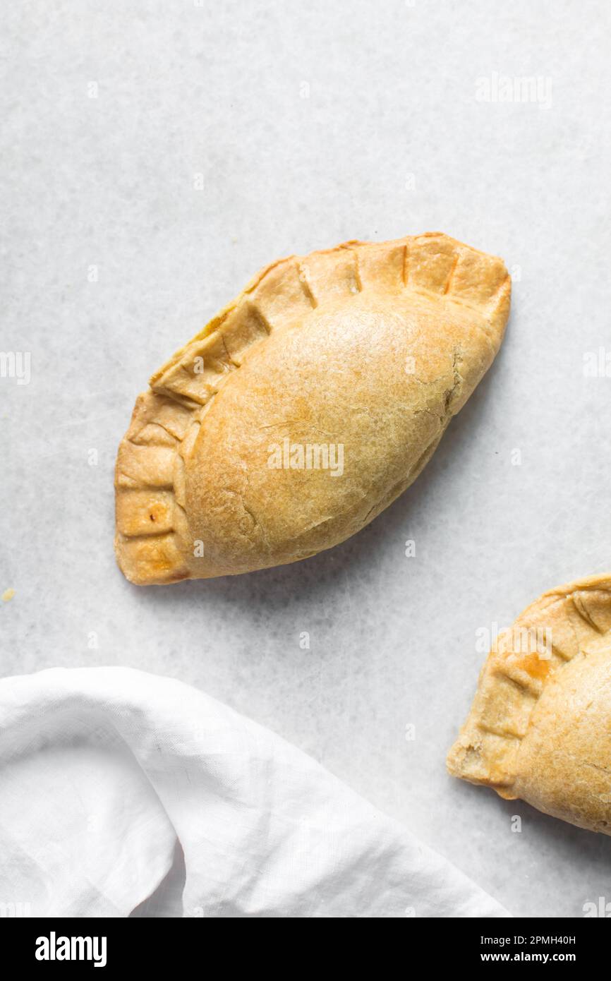 Nigerian meat pie on a marble tray, freshly baked nigerian meat pie ...