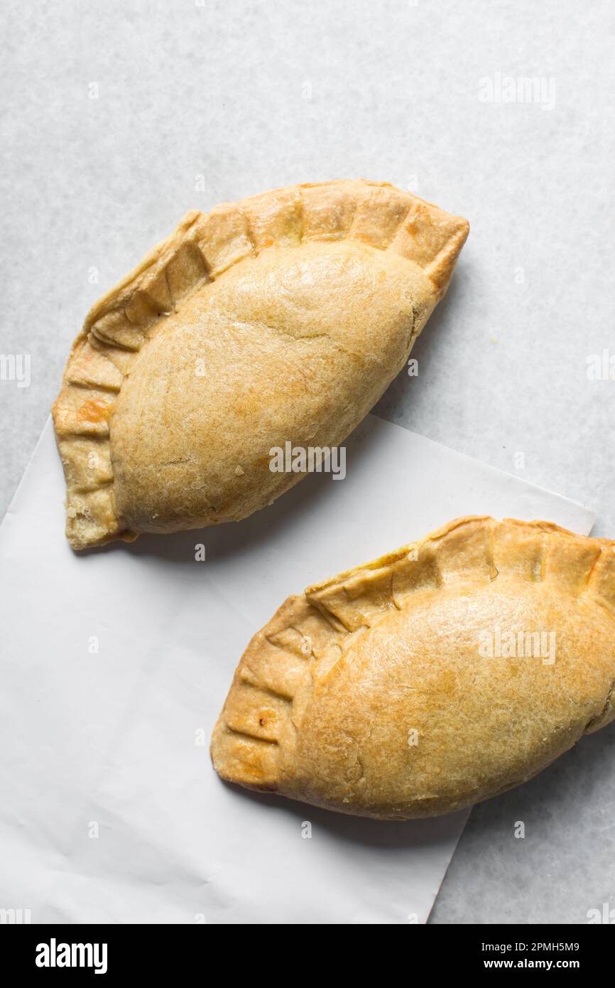 Nigerian meat pie on a marble tray, freshly baked nigerian meat pie ...