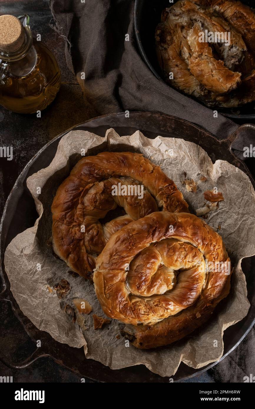 Salt pie in a pan, traditional baked food, rustic viewb Stock Photo - Alamy