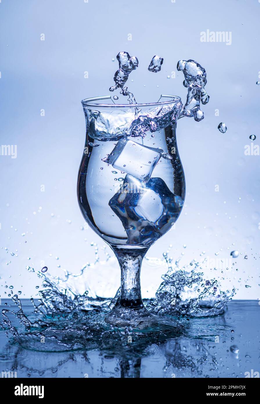 The image of pouring drinking water, into a glass broken, that makes ...
