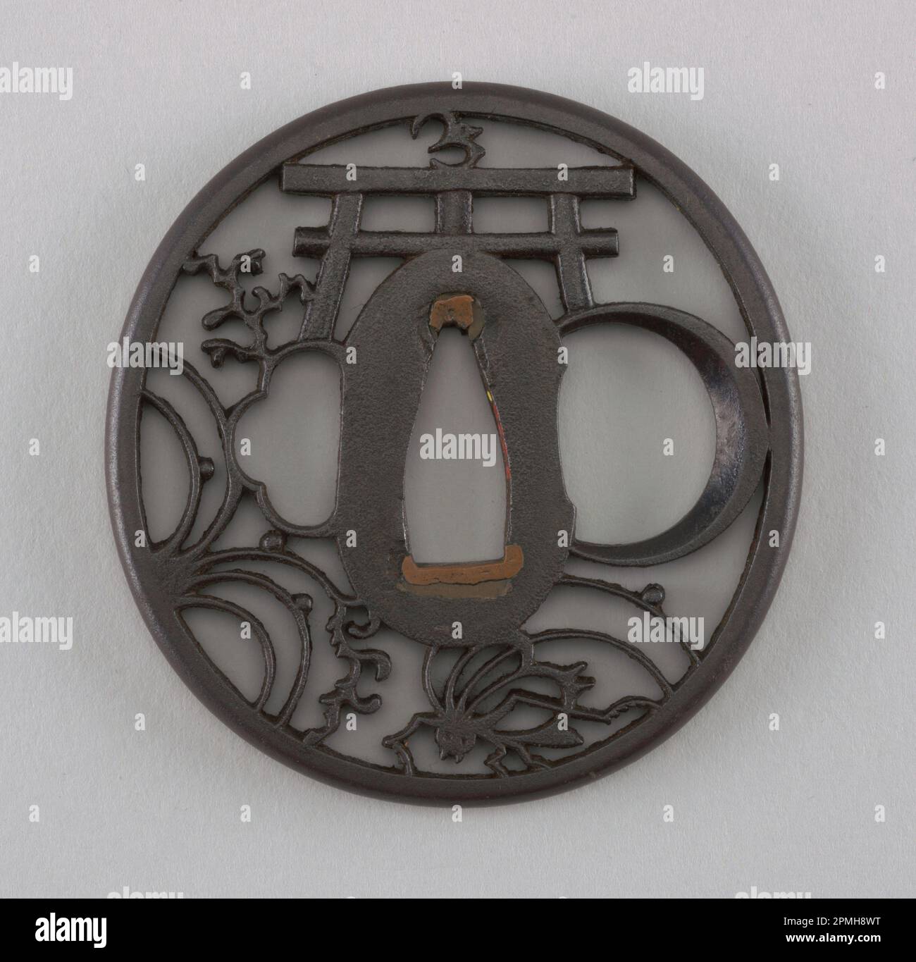 Tsuba; iron, shakudo (a soft copper and gold alloy Stock Photo - Alamy