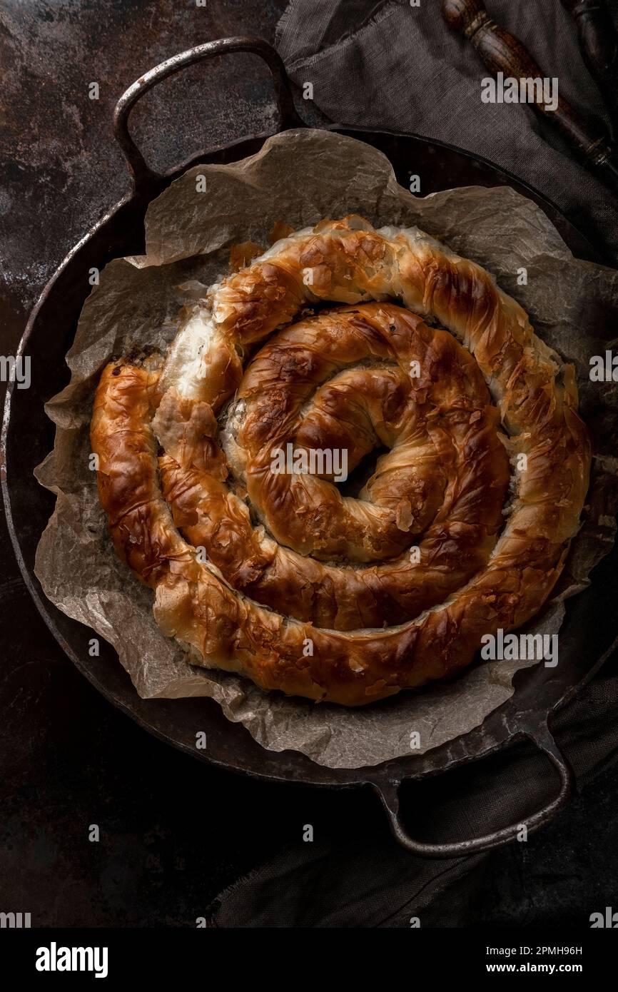Salt pie in a pan, traditional baked food, rustic viewb Stock Photo - Alamy