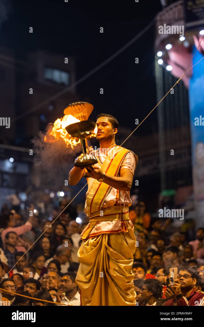Ganga aarti, Portrait of an young priest performing river ganges ...
