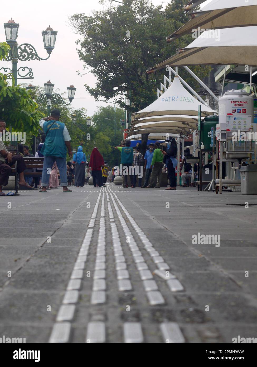 pedestrian conditions in Yogyakarta with guiding blocks for the blind ...