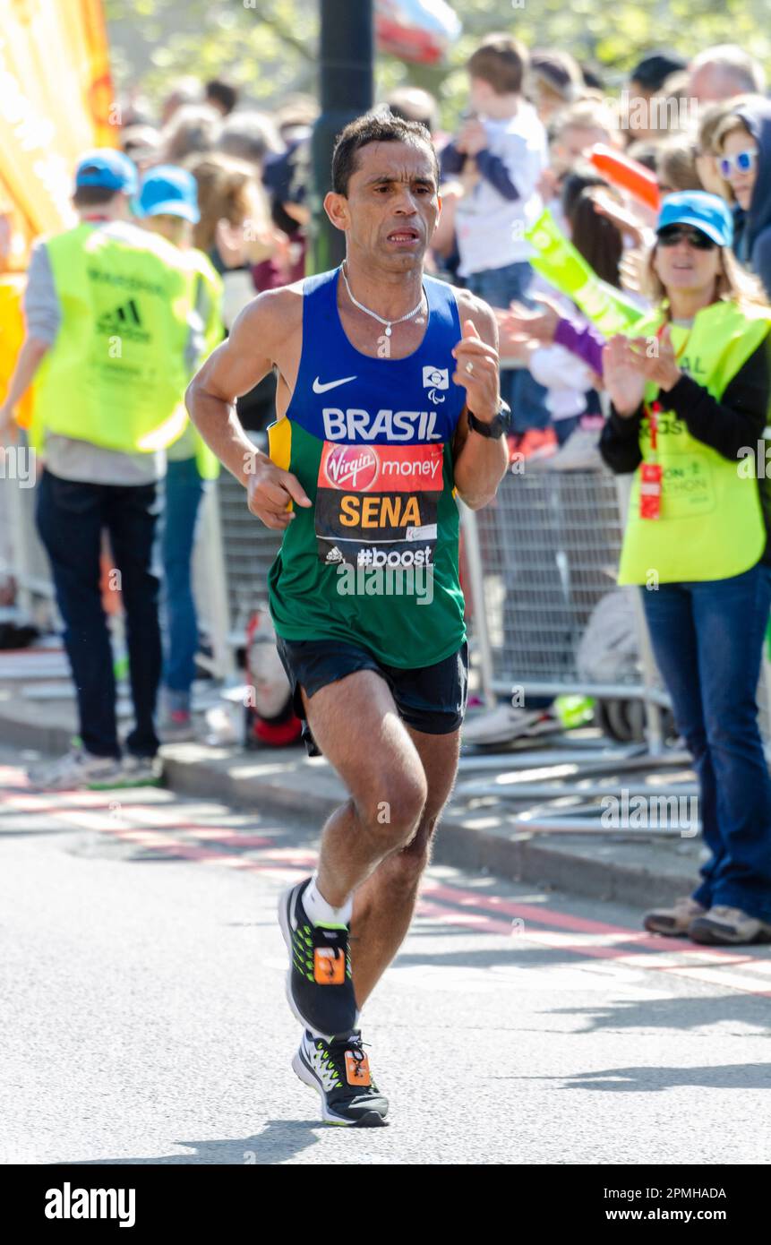 Tito Sena competing in the London Marathon 2014, passing through Tower ...