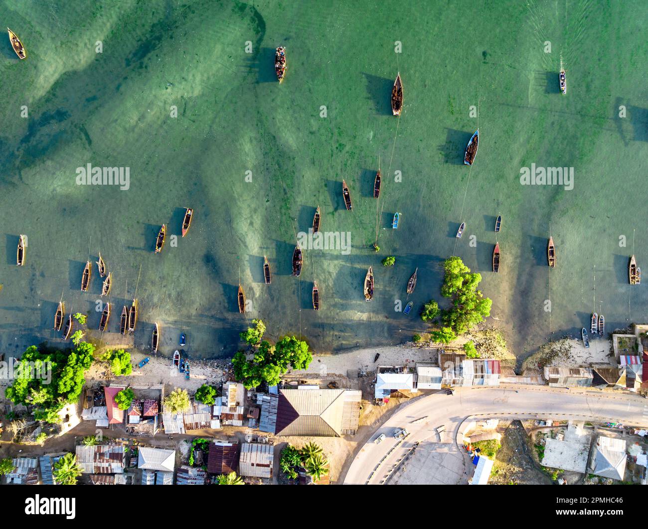 Aerial view of boats moored in the exotic lagoon, Mkokotoni, Zanzibar ...