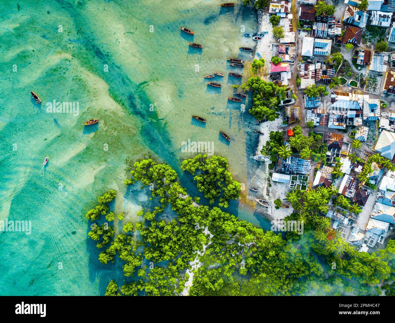 Aerial view of fishing boats moored in the exotic lagoon, Mkokotoni ...
