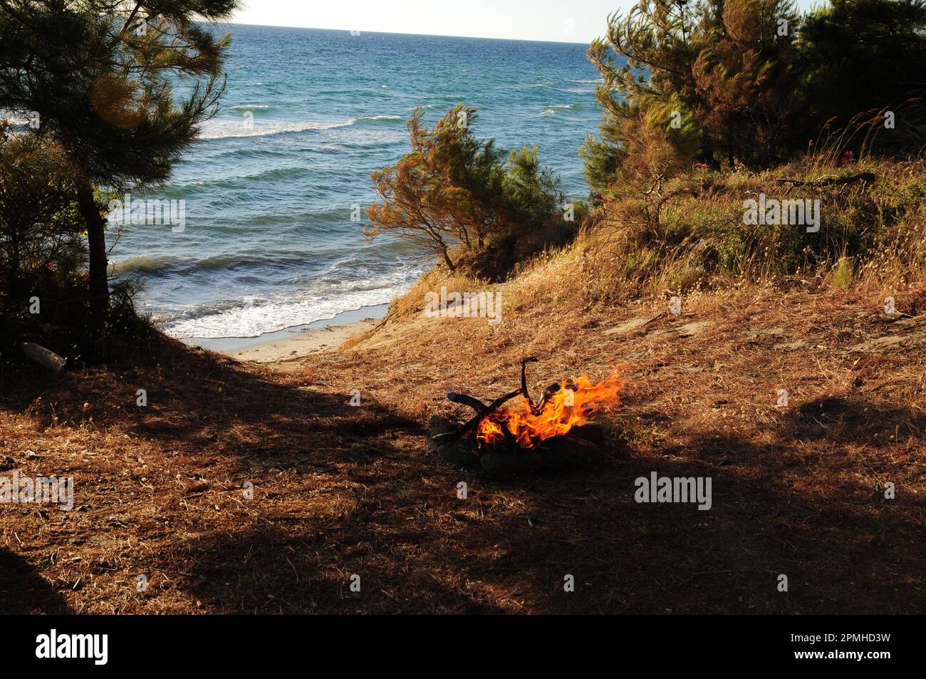 Campers burning fire in Turkey Stock Photo - Alamy