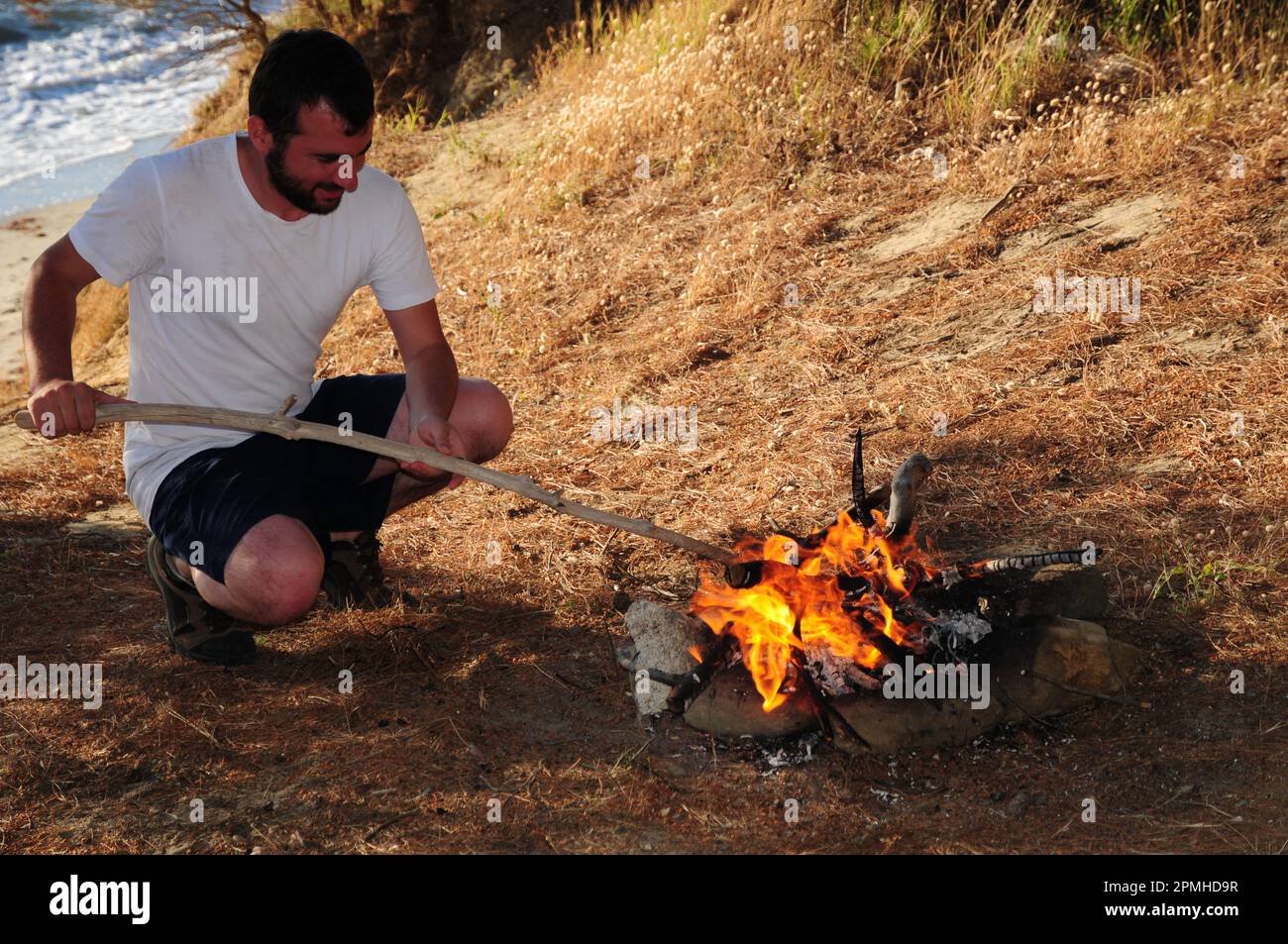 Campers burning fire in Turkey Stock Photo - Alamy