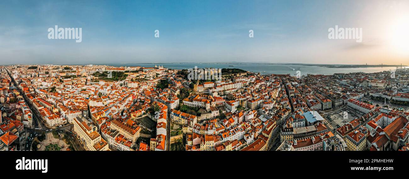 Aerial drone view of Baixa District, facing south towards the Tagus ...