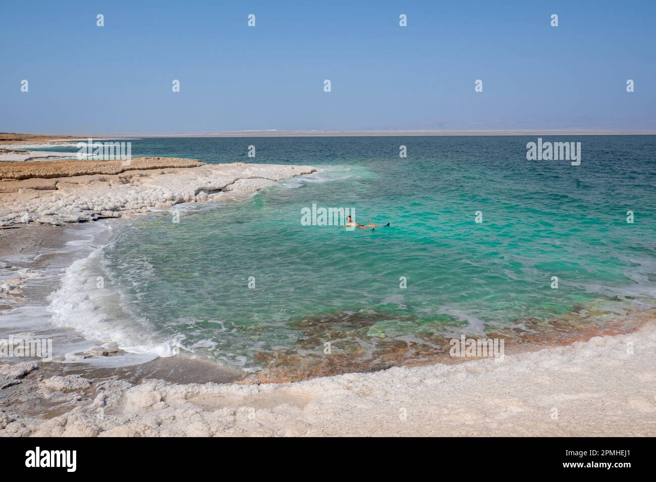 Shore with salt crystalized formation and turquoise water, The Dead Sea ...