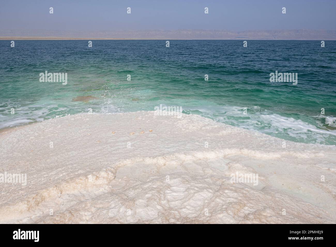 Shore with salt crystalized formation and turquoise water, The Dead Sea ...