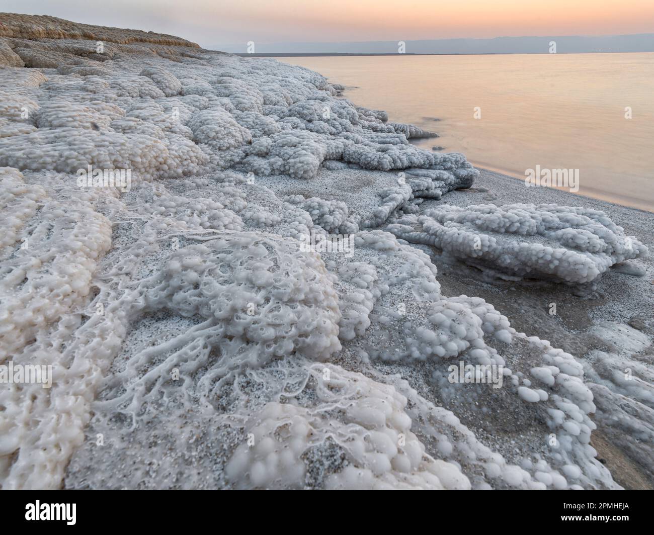 Shore with salt crystalized formation at dusk, The Dead Sea, Jordan ...
