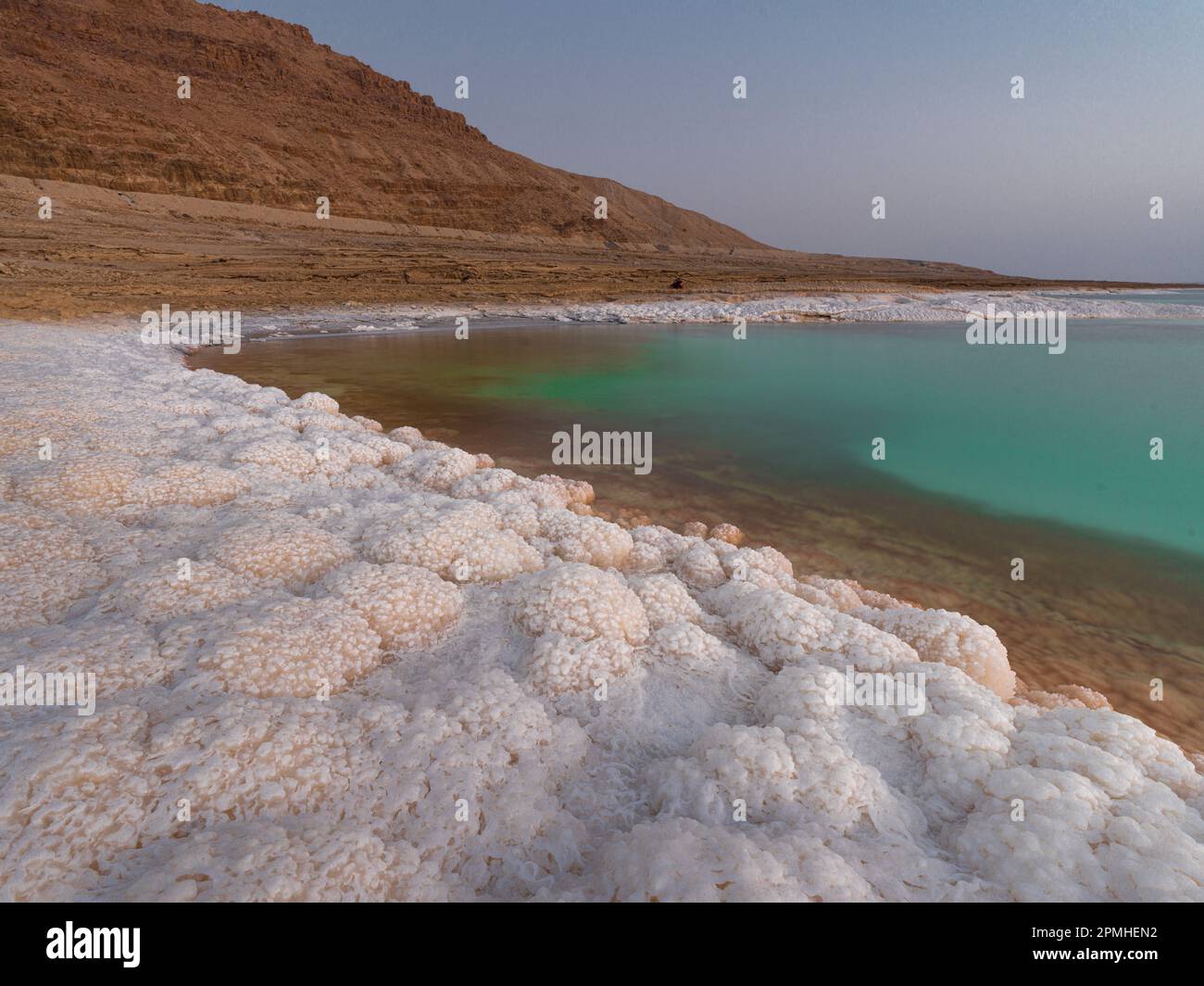 Shore with salt crystalized formation and turquoise water, The Dead Sea ...