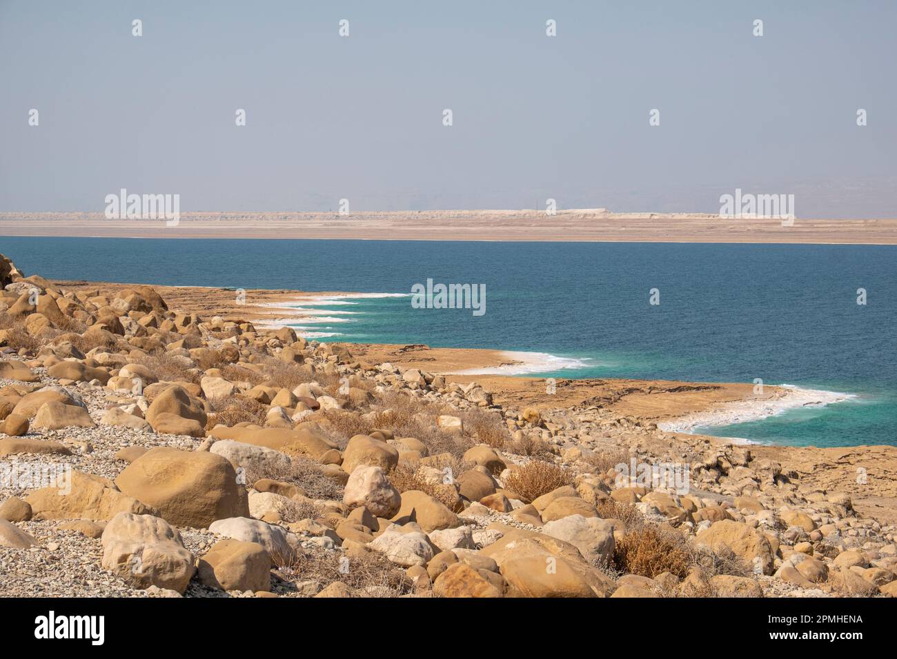 The shore with white salt formation on the beach, Dead Sea, Jordan ...