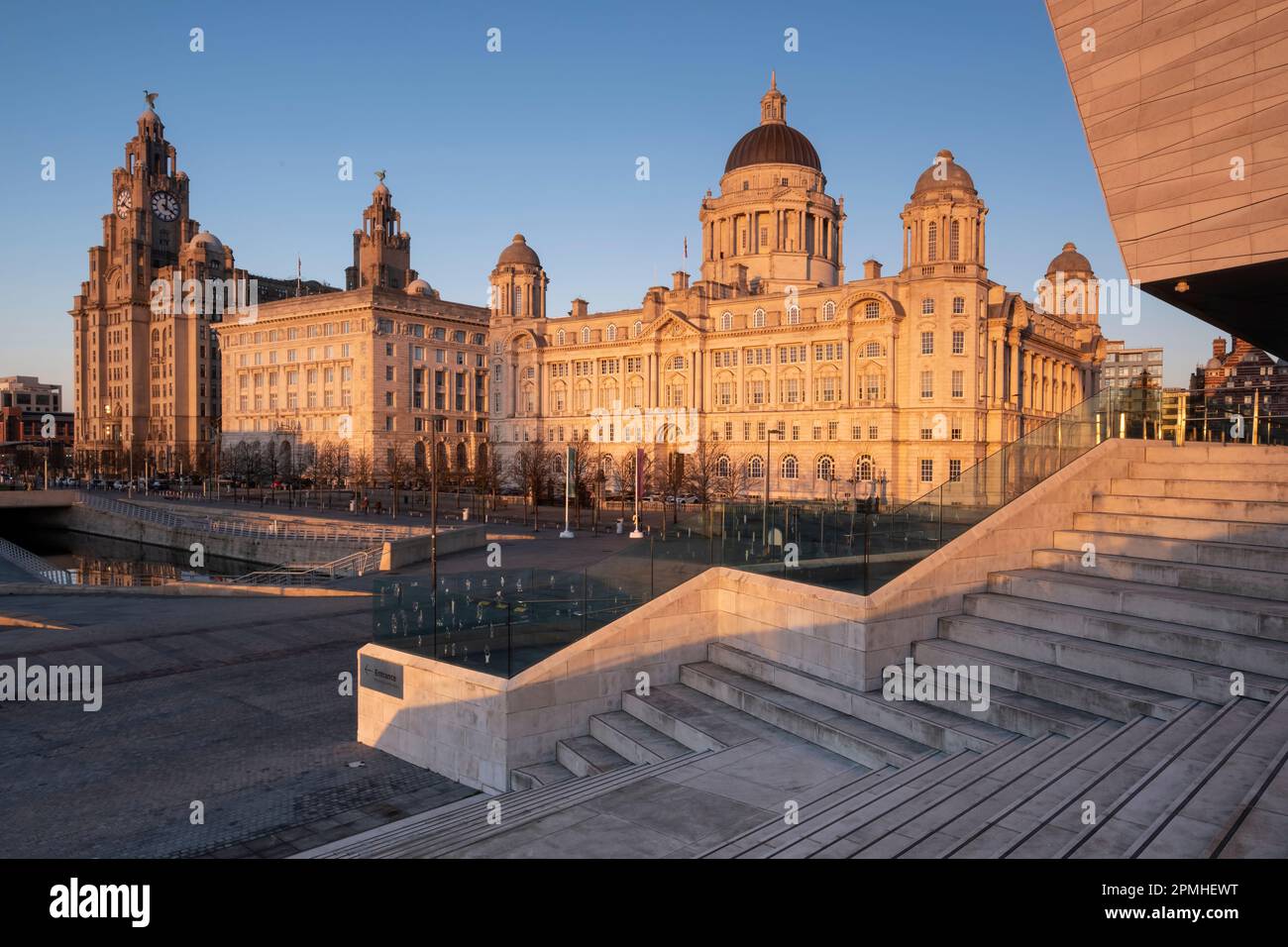 Evening light illuminates the Liver Building, the Cunard Building and ...