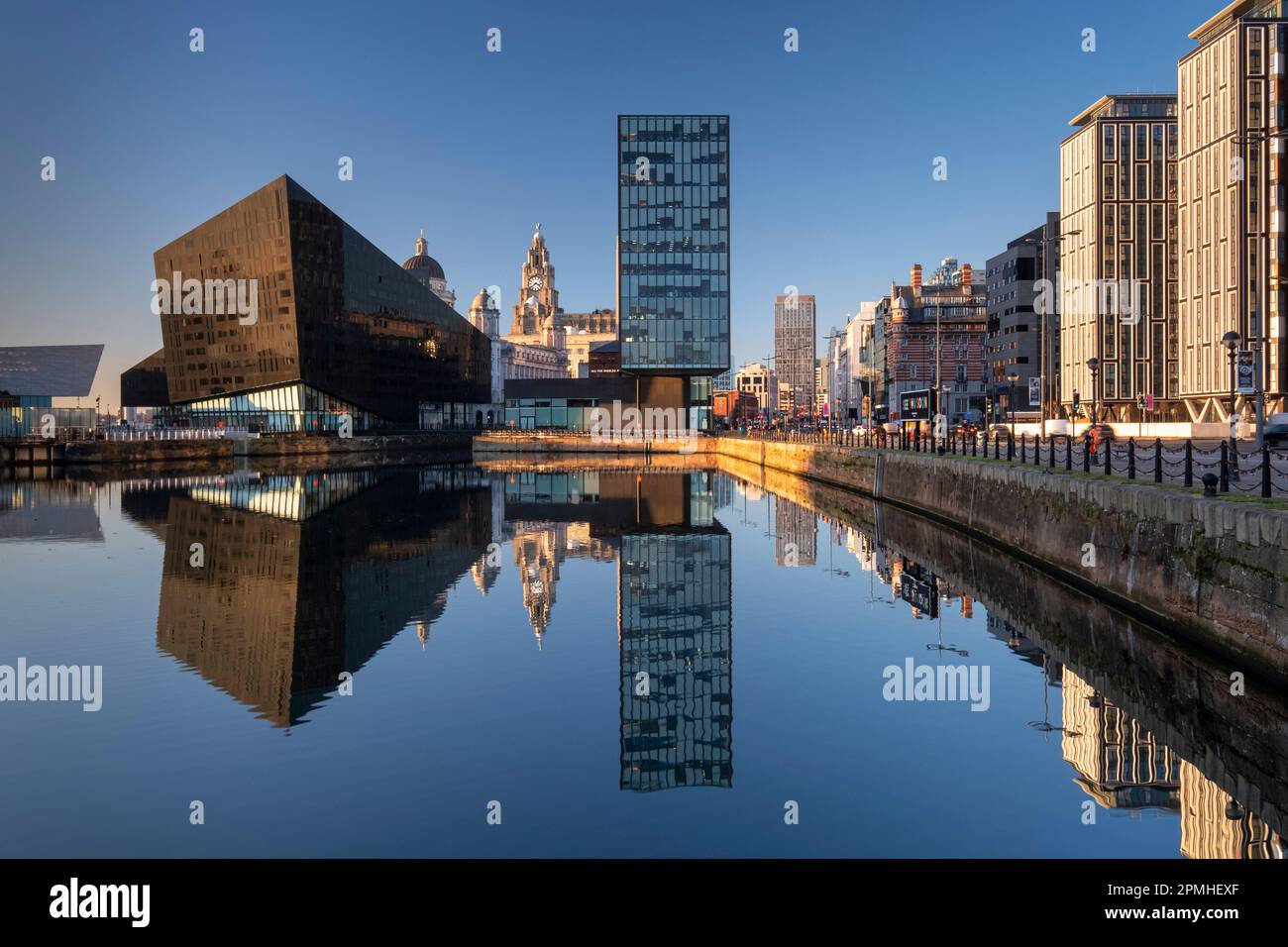 Liverpool Waterfront and the Liver Building reflected in Canning Dock ...