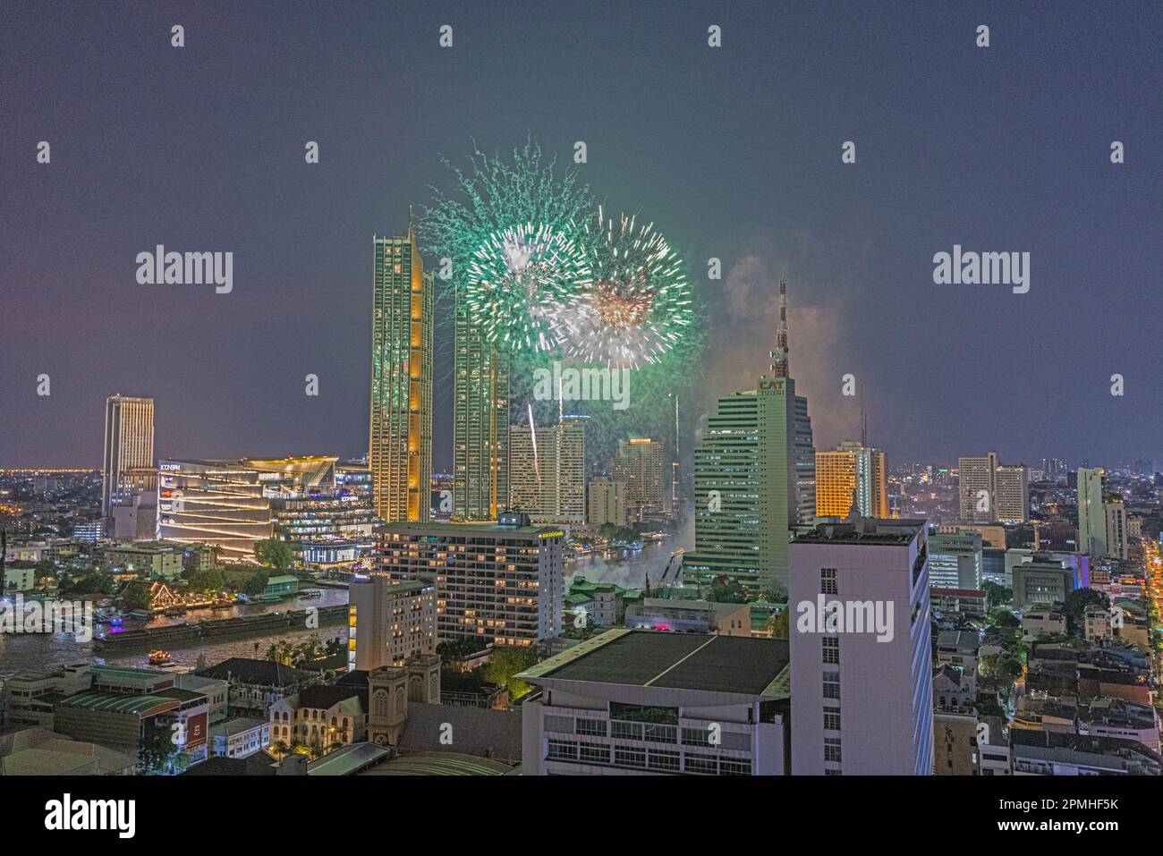 Aerial view of a fireworks display over the Chao Phraya River in ...