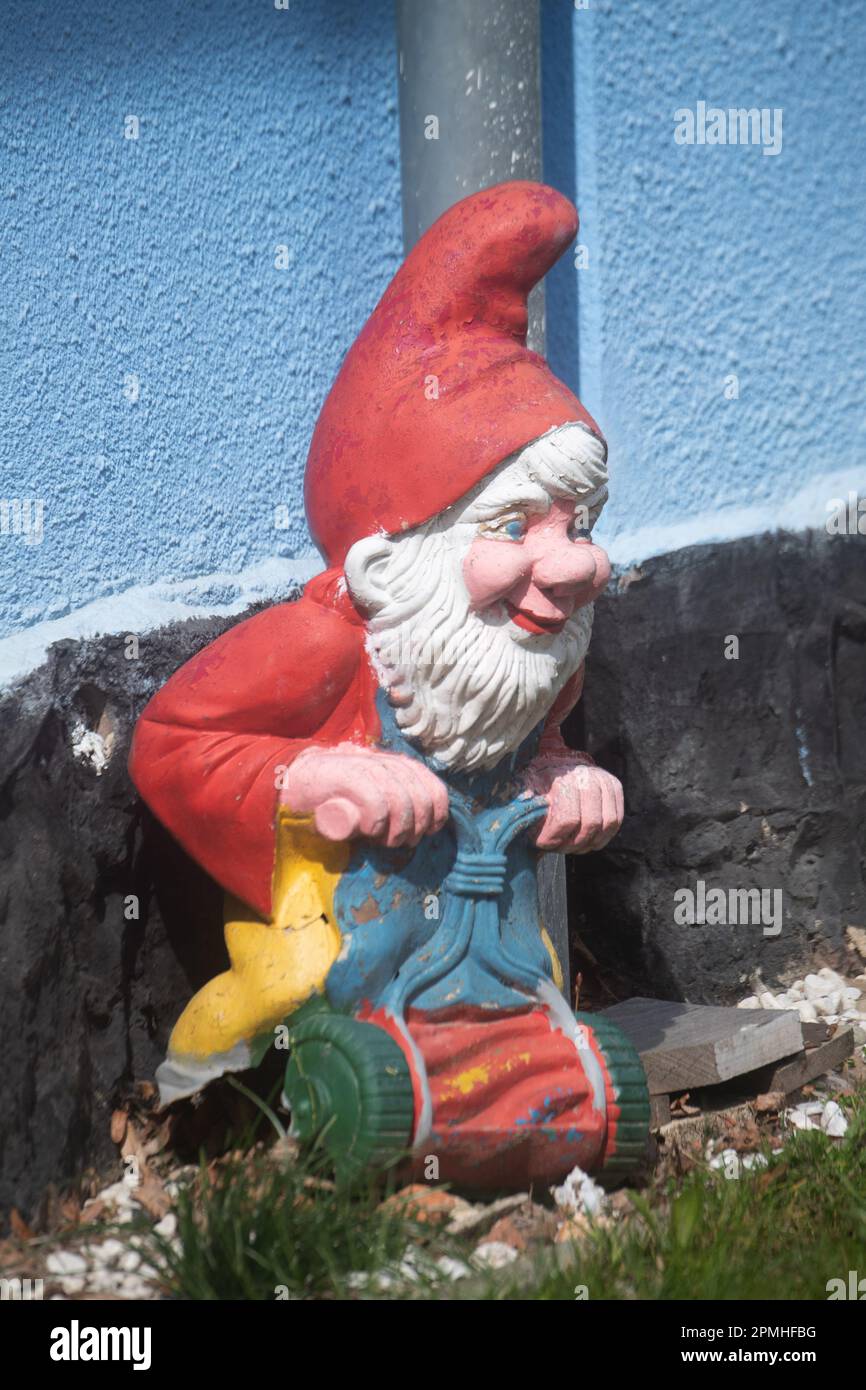 Franzburg, Germany. 13th Apr, 2023. A garden gnome stands in a garden ...