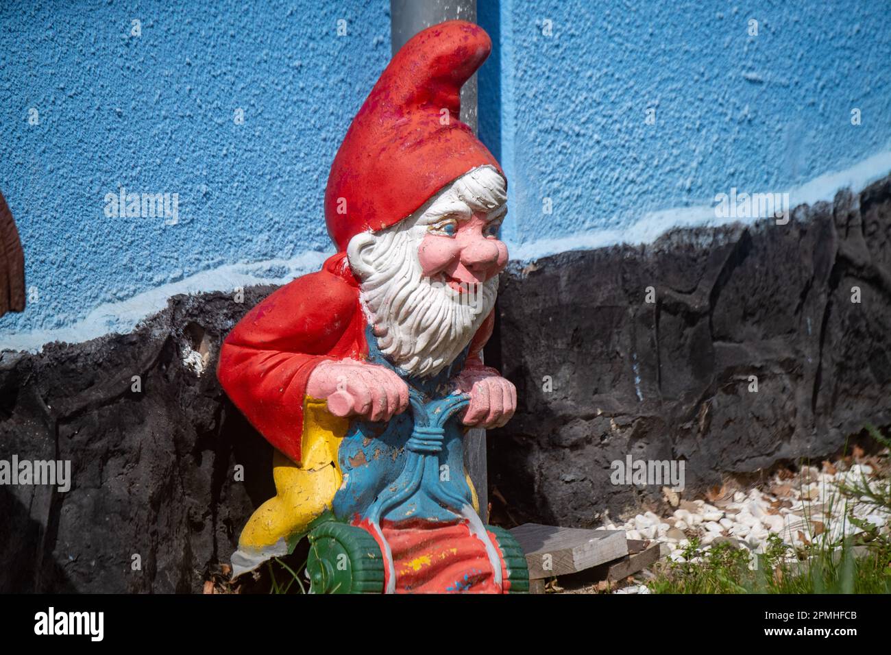Franzburg, Germany. 13th Apr, 2023. A garden gnome stands in a garden ...