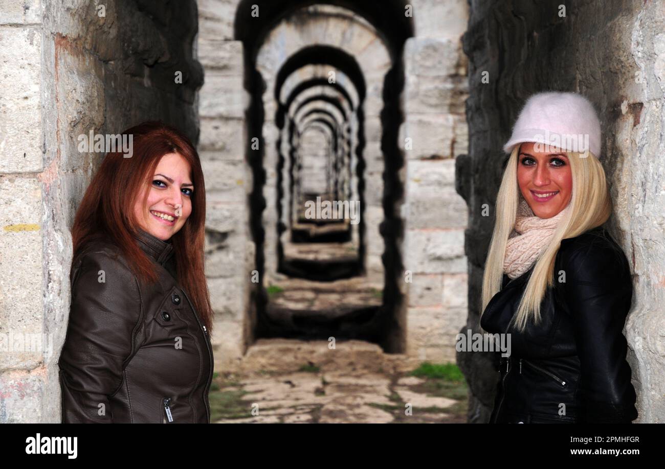 People posing in historical buildings in Turkey Stock Photo - Alamy