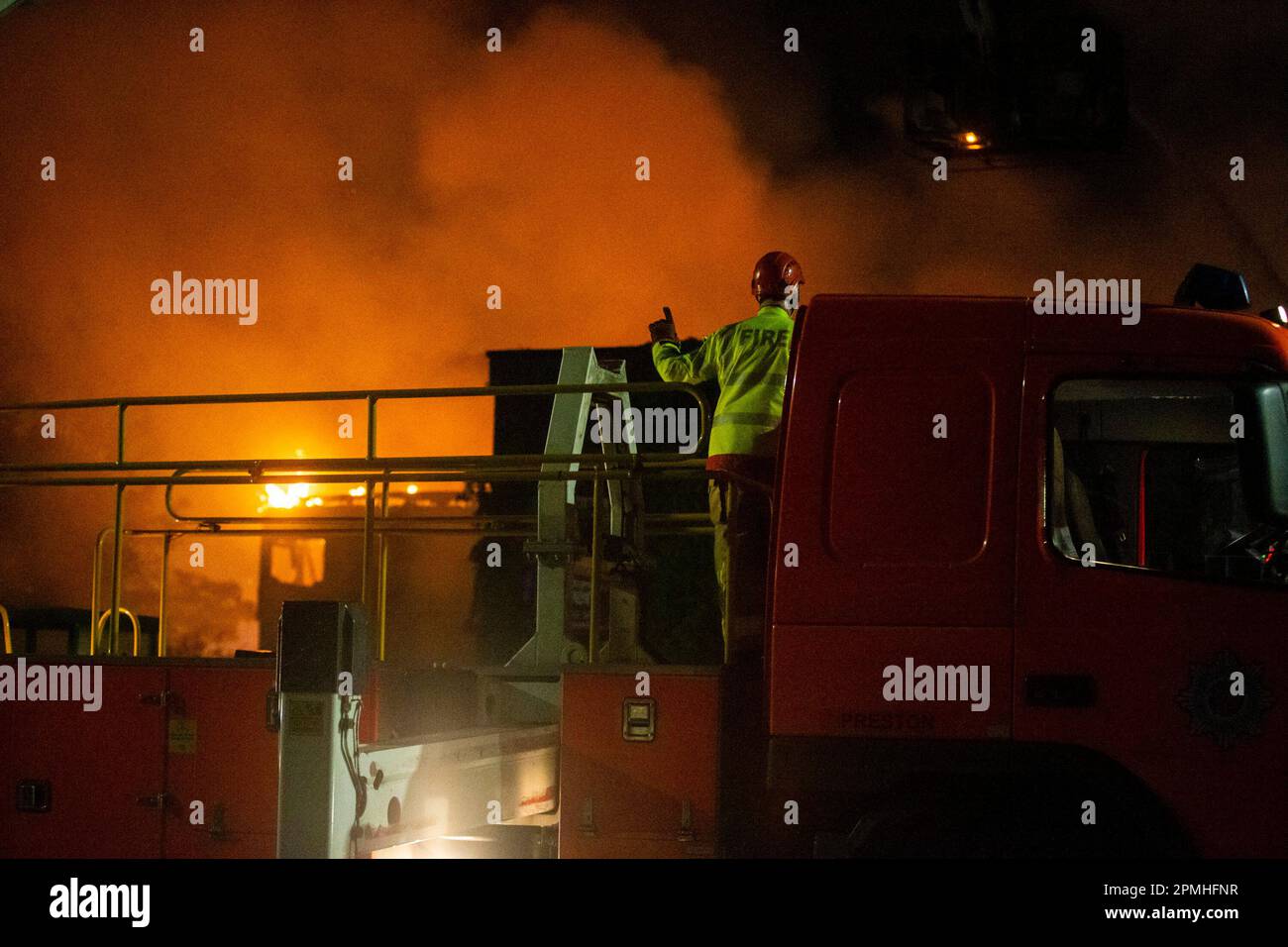 15/09/2020. Skelmersdale, UK. Fire crew attempt to bring large fire ...