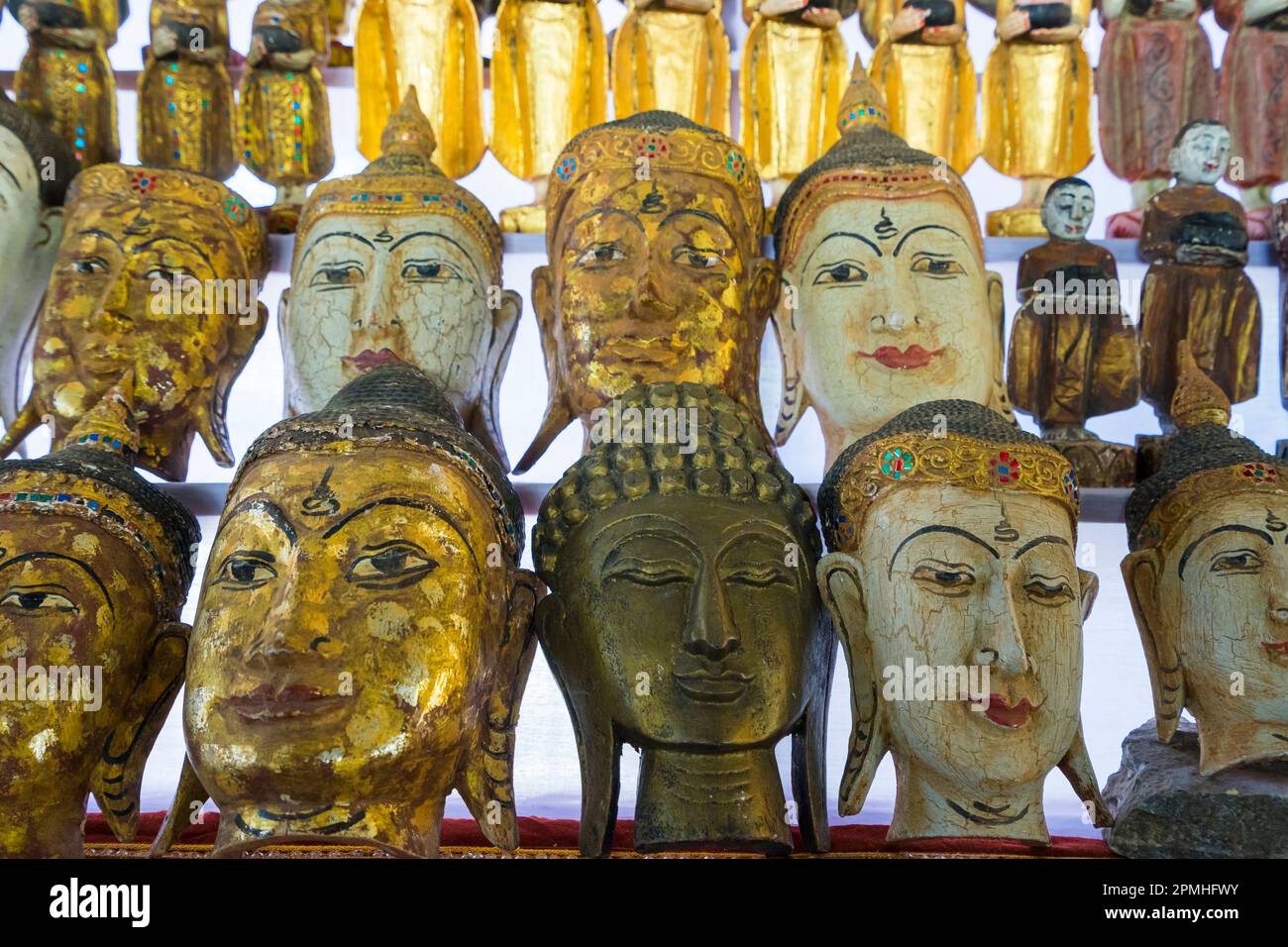 Buddha masks on display at shop, Mandalay, Myanmar (Burma), Asia Stock ...