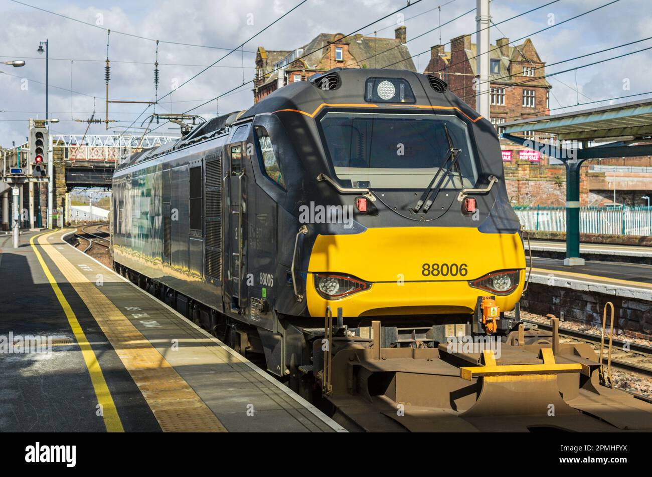 88006 'Juno' at platform 3 at Carlisle railway station working the 4S43 ...