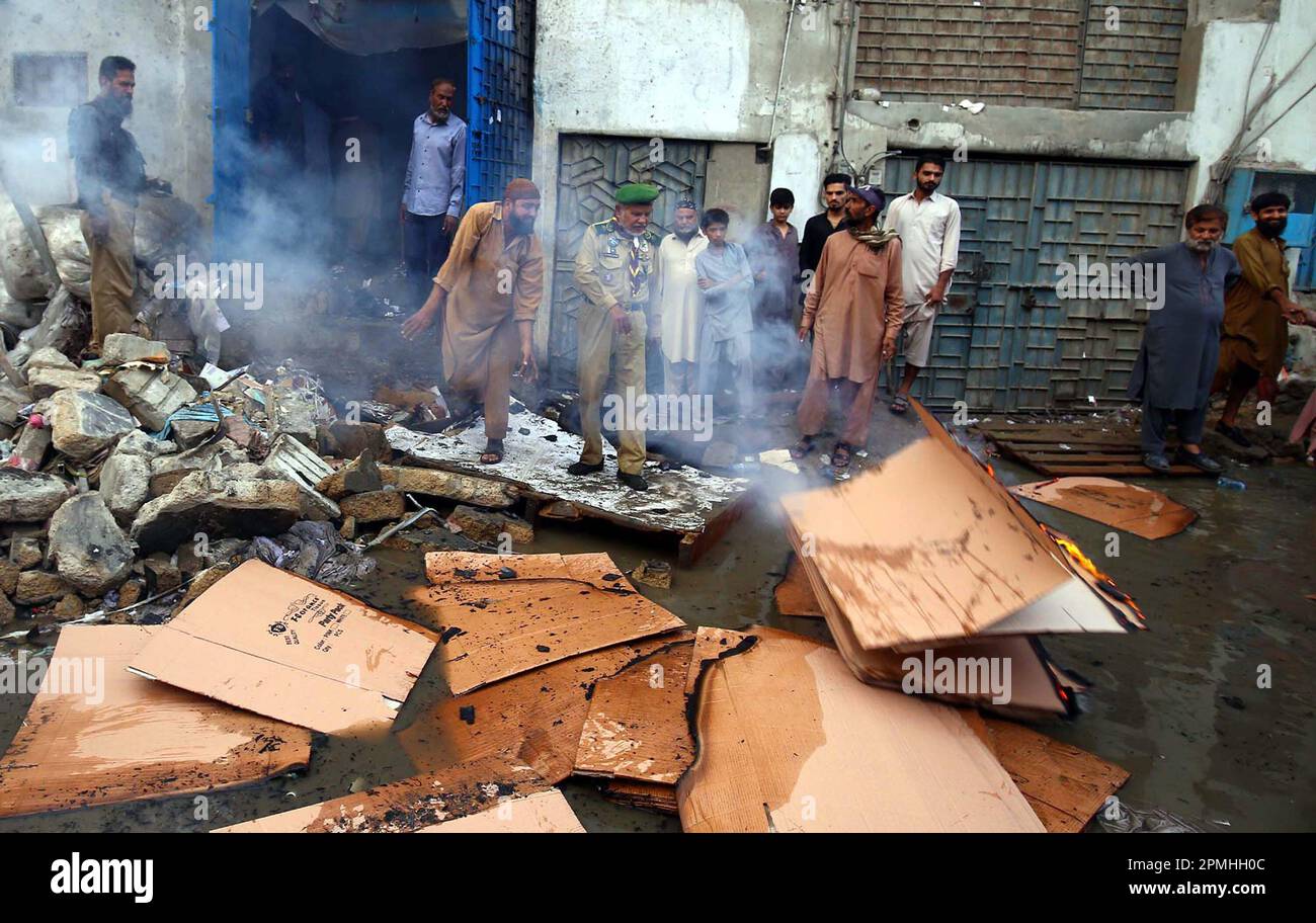 Peshawar, Pakistan, April 13, 2023. Rescue officials are busy in rescue operation after a ...