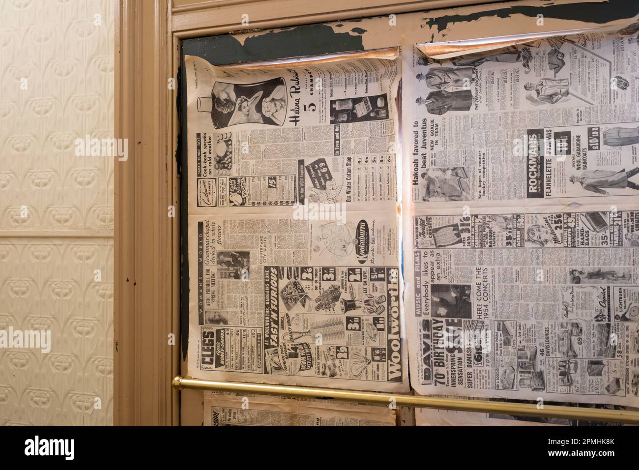 Windows taped up with old yellowed newspapers by Melbourne-based artist ...