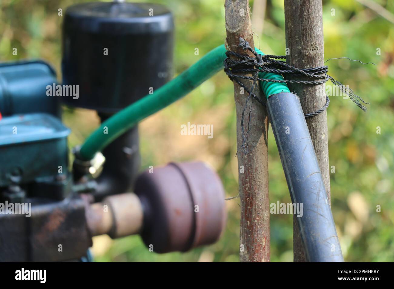 View of a Pipe that carries hot water from the cylinder head during the ...