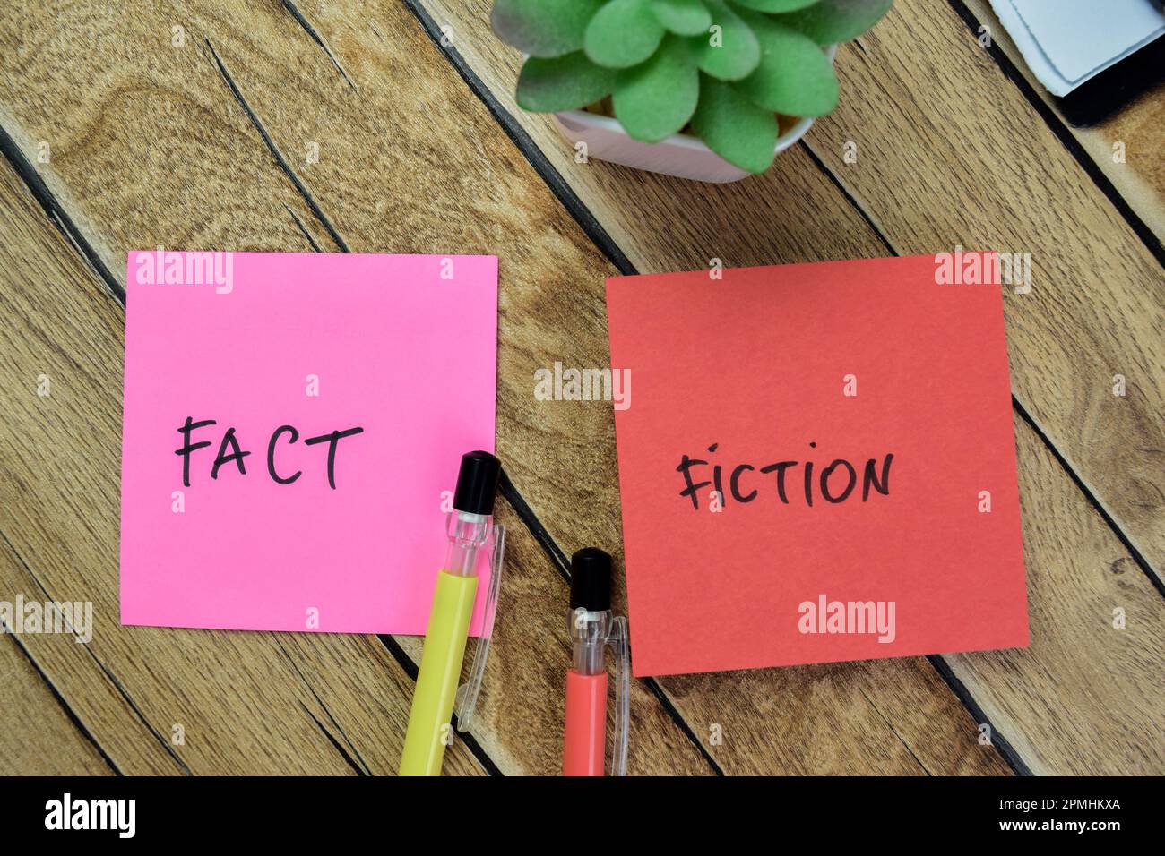 Concept of Fact or Opinion write on sticky notes isolated on Wooden ...