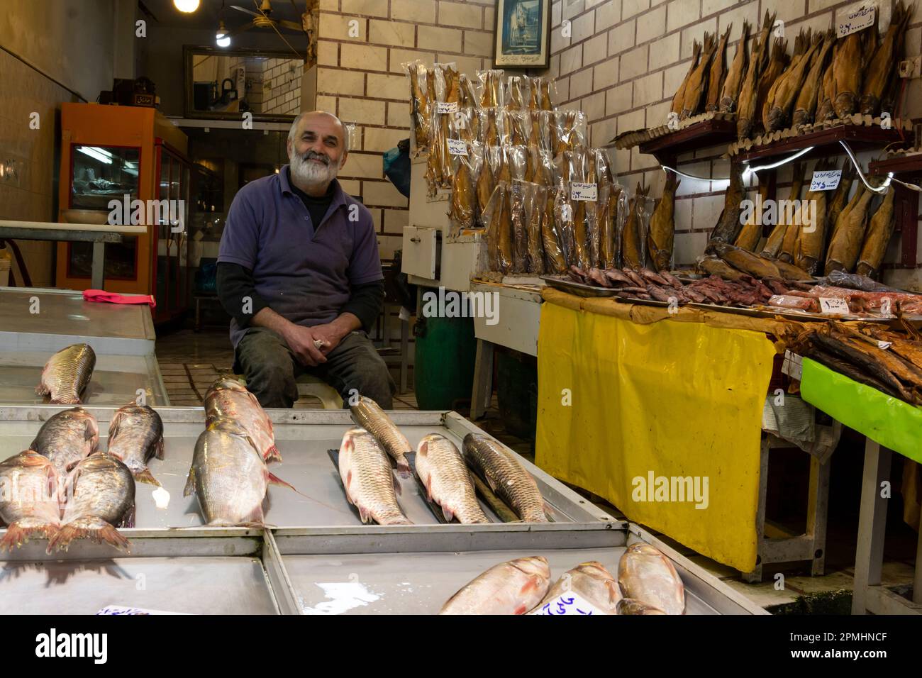 Gilan Province- Rasht IRAN-April 9, 2023- Daily bazaar-middle age man ...