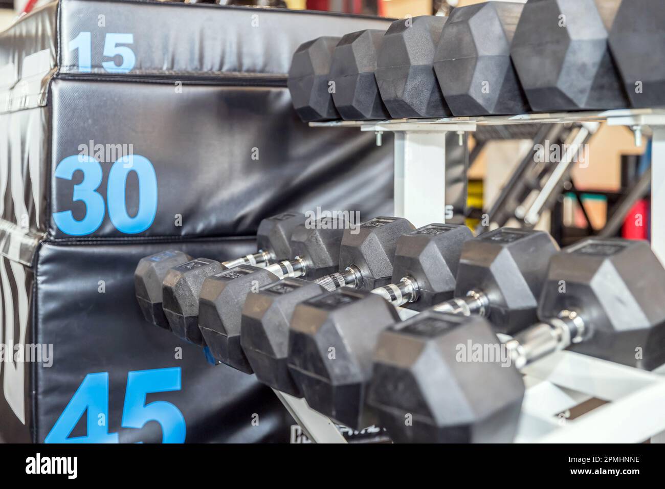 Row of Hand Barbells weight training equipment. Concept of health Stock ...