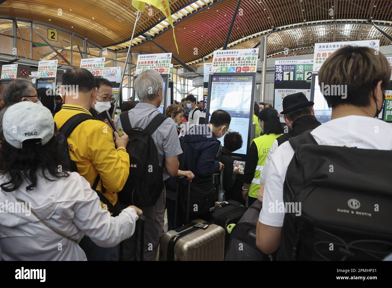 People queue up for Hong Kong-Zhuhai-Macao Bridge Shuttle Bus at Hong ...