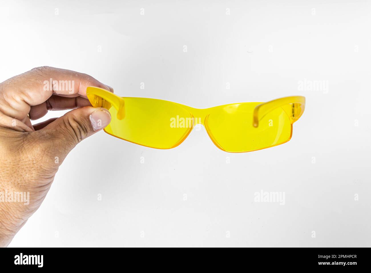 Safety glasses with yellow lenses, also used for observing corals under ...