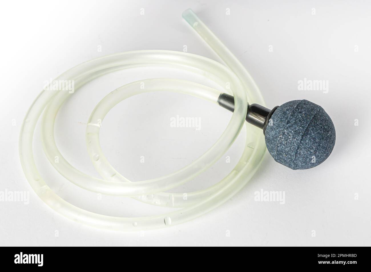 Small transparent hose with porous stone at the end to generate air ...