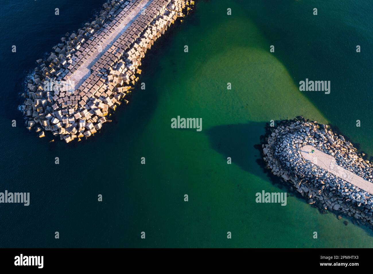 drone aerial view of a port harbor breakwater Stock Photo - Alamy