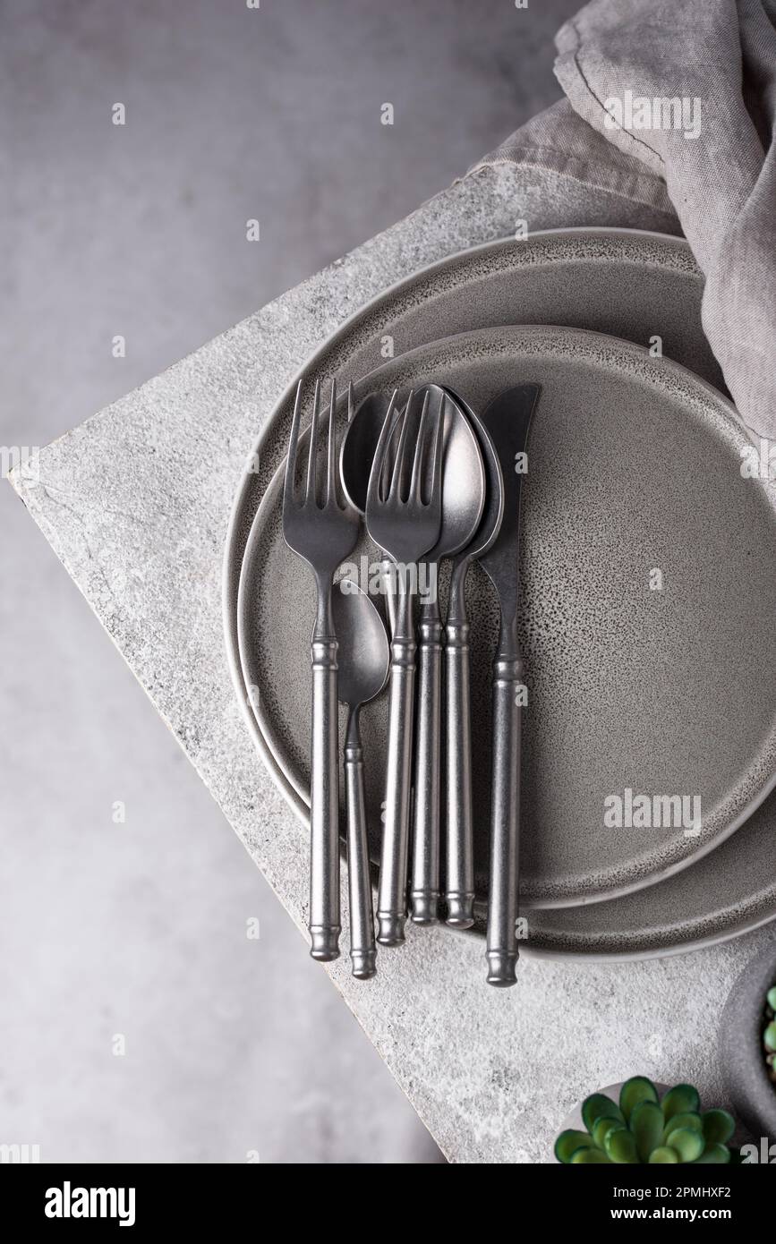 Steel modern cutlery, knife, spoon and fork Stock Photo - Alamy