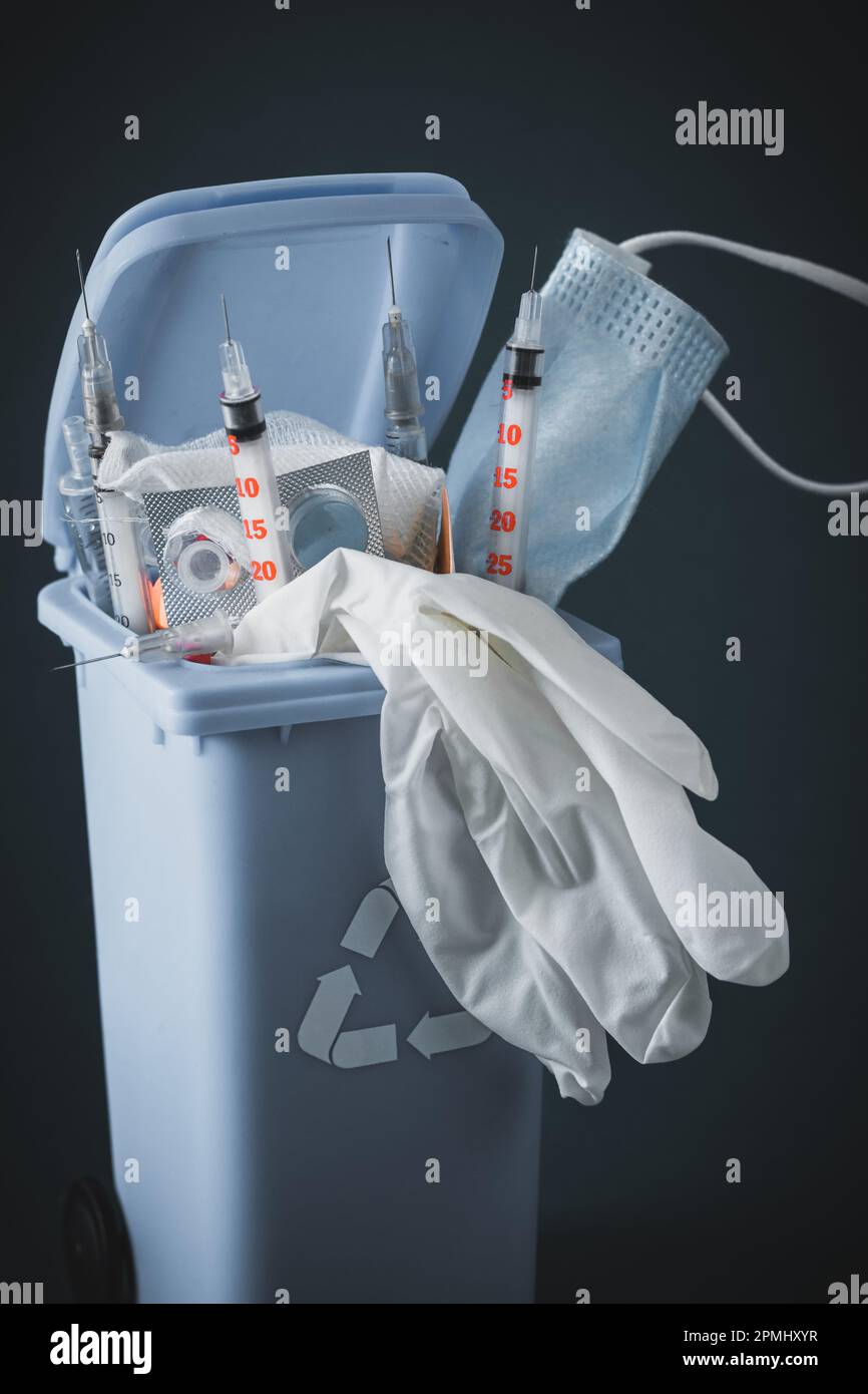 Medical waste concept, Open garbage full of pills, syringes, bandages ...