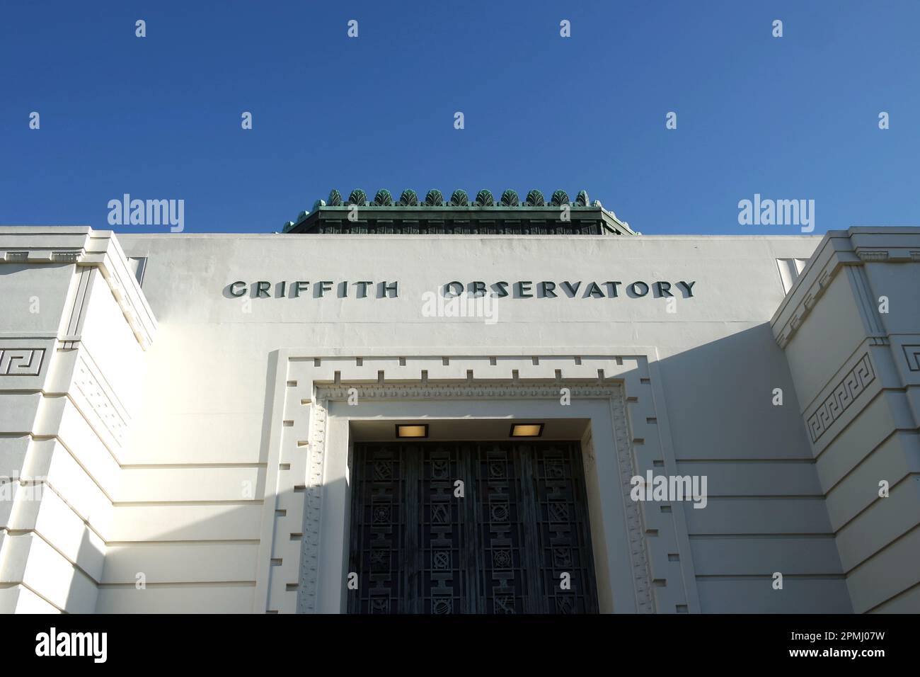 The photo displays the entrance of Griffith Observatory in Los Angeles ...