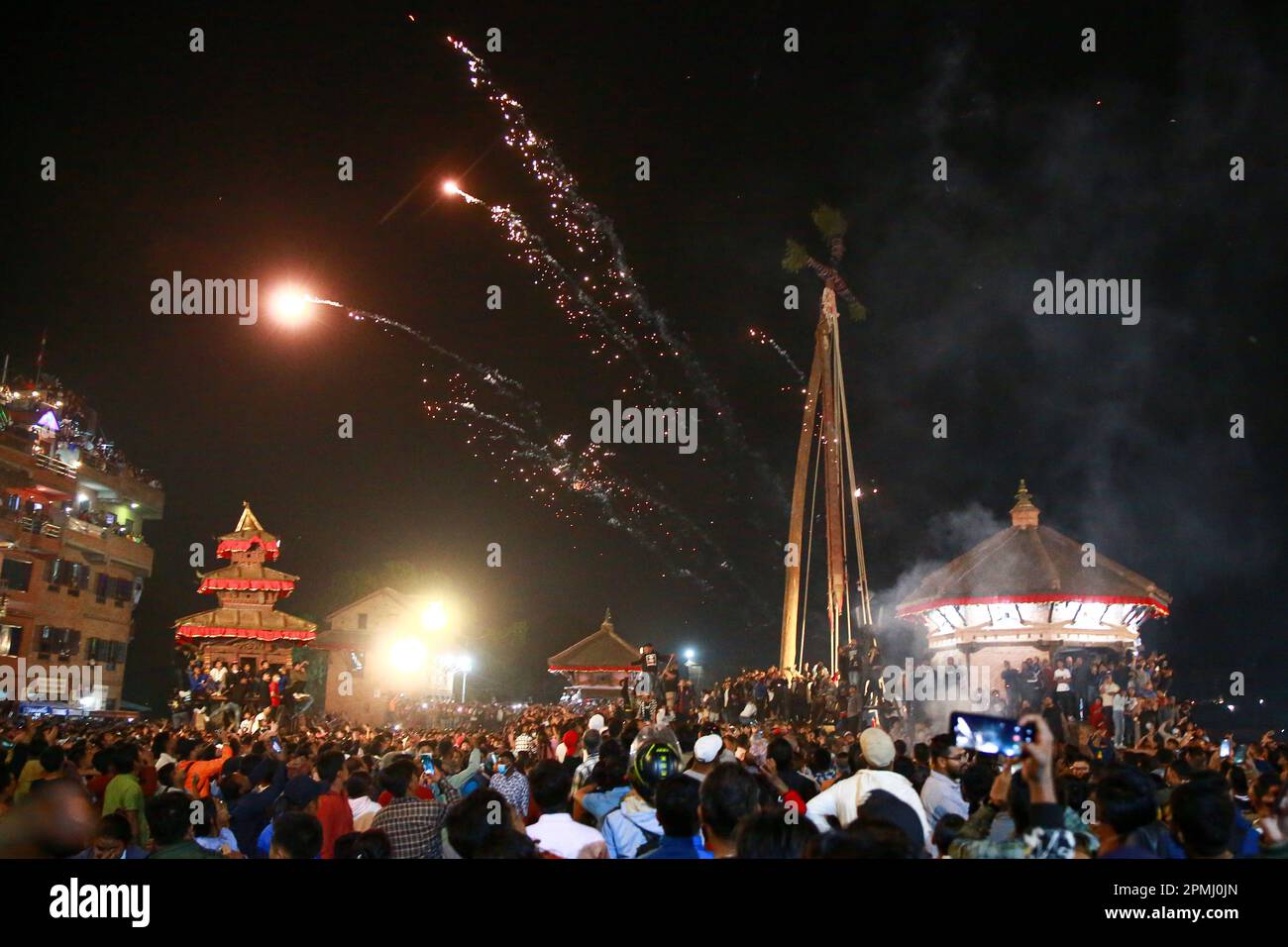 Nepal. 13th Apr, 2023. Firecrackers are burst on to the sky while ...