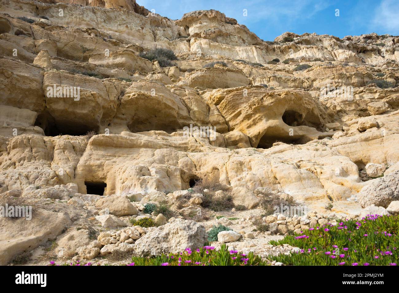 Rock caves, residential caves, Matala, Crete, Greece Stock Photo - Alamy
