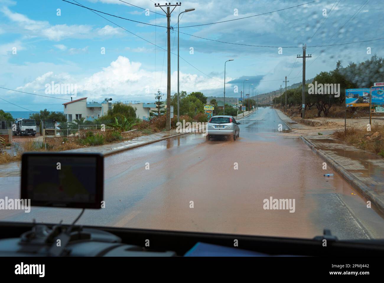 Road after continuous rain, Ksamil, Albania, Heavy rain Stock Photo - Alamy
