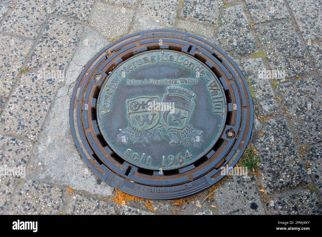 Manhole cover, Walluf, Hesse, Germany Stock Photo - Alamy